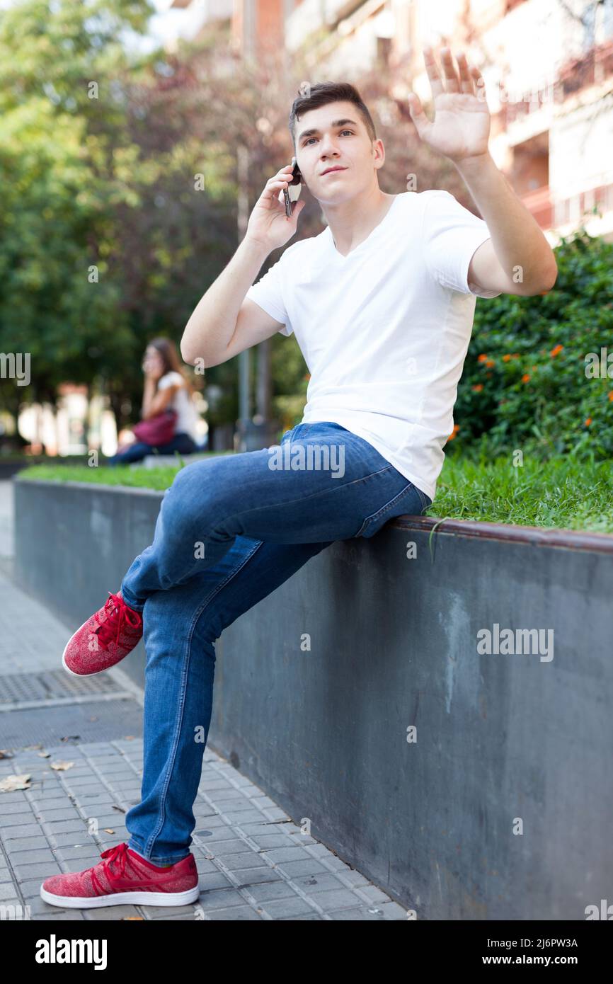 Portrait young guy talking hi-res stock photography and images - Alamy