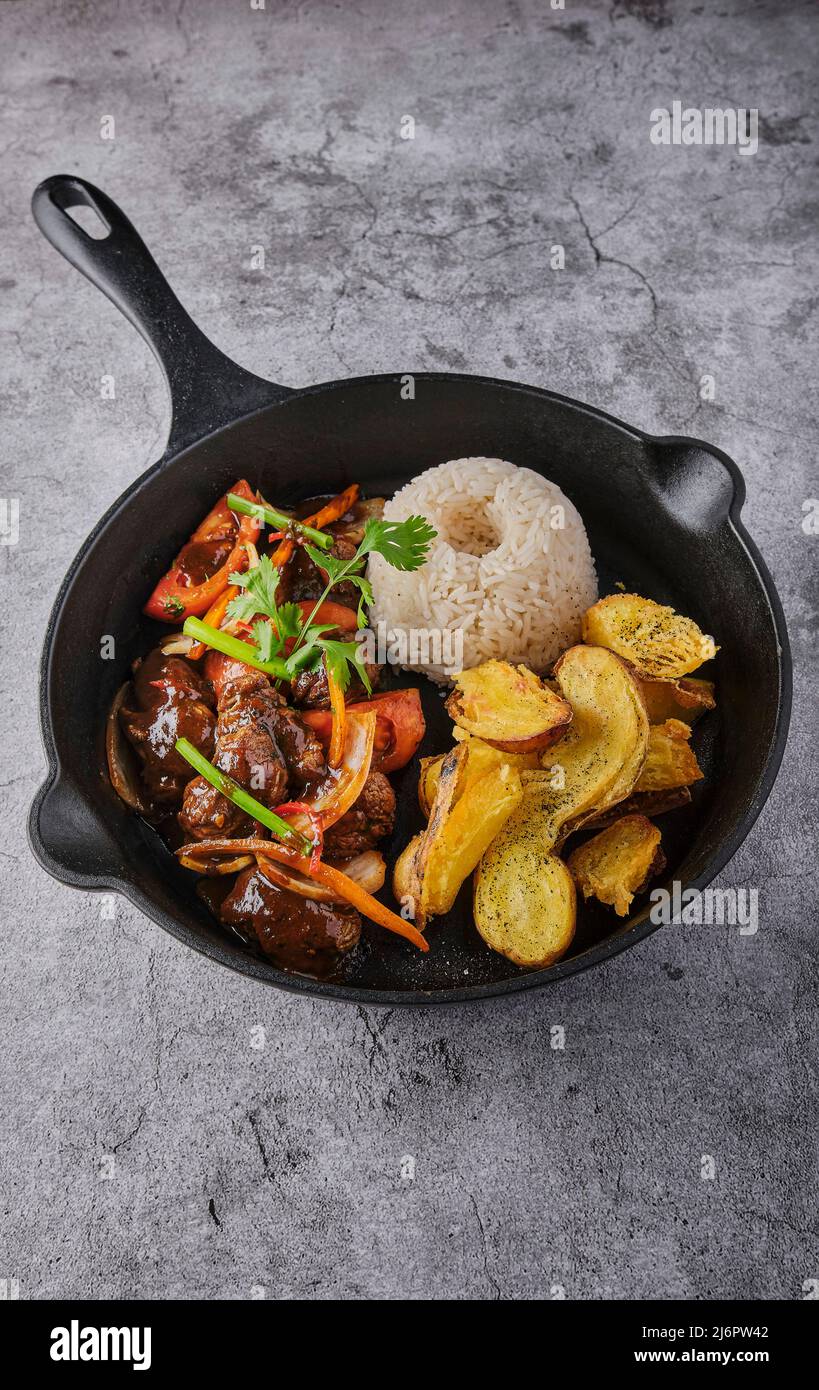Peruvian d food - Lomo saltado - beef tenderloin with purple onion ...