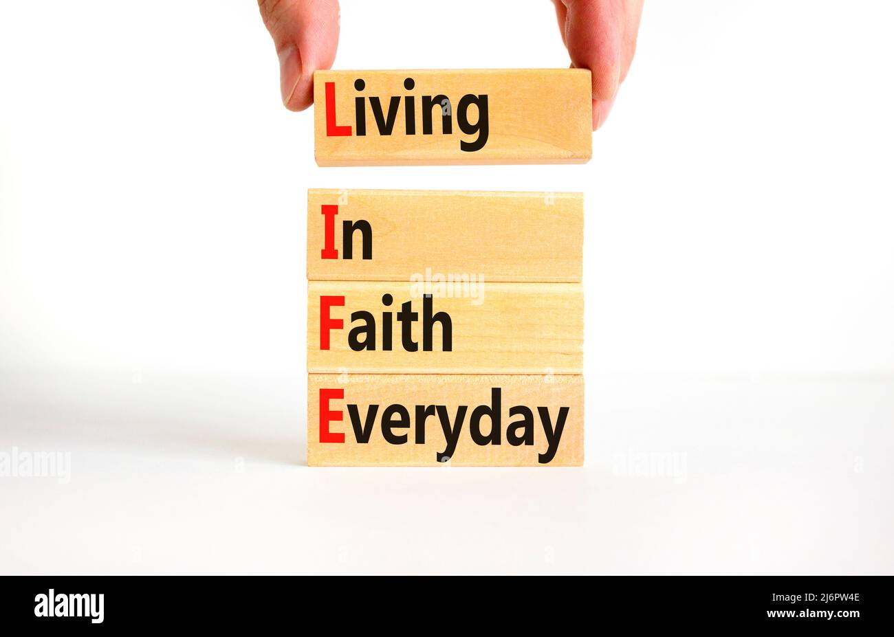 LIFE living in faith everyday symbol. Concept words LIFE living in ...