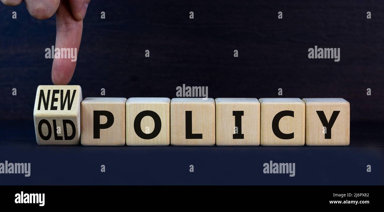 New or old policy symbol. Turned wooden cubes changed concept words Old ...