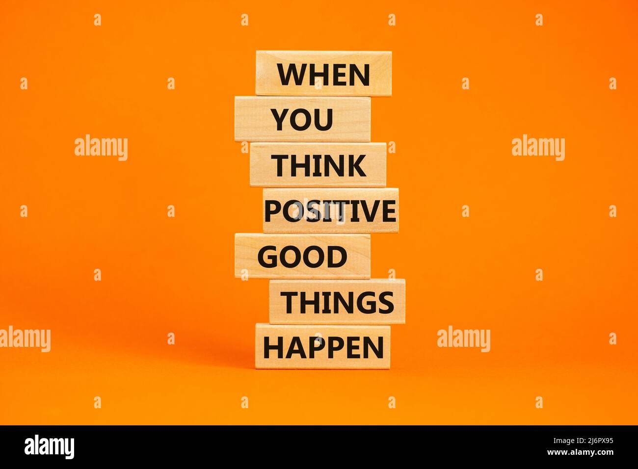 Think positive symbol. Wooden blocks with concept words When you think ...