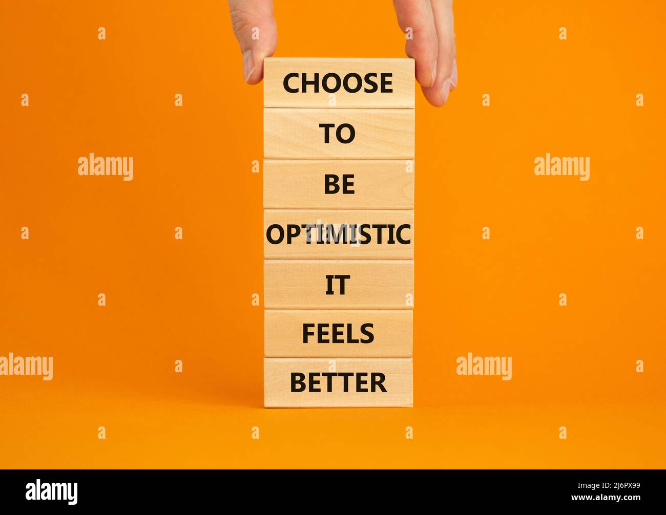 Optimistic is better symbol. Wooden blocks with words Choose to be ...