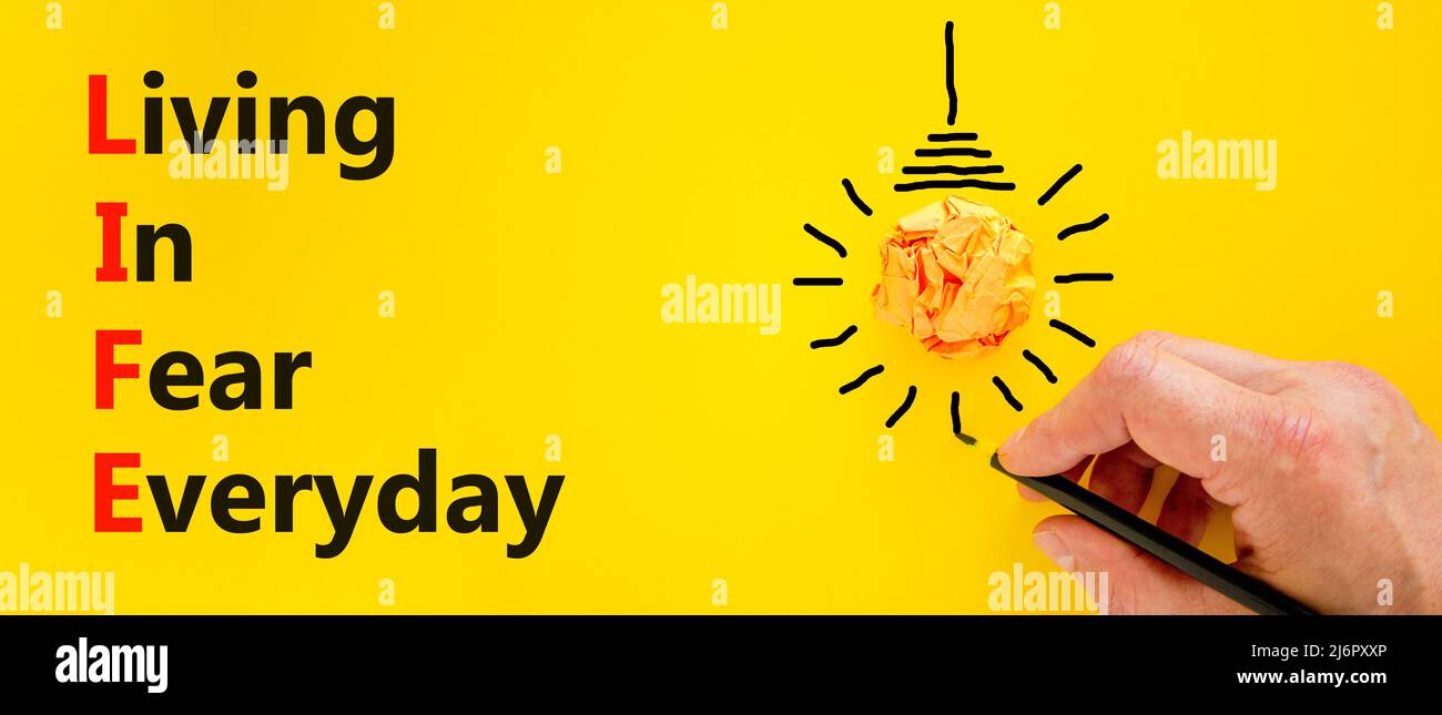 LIFE living in fear everyday symbol. Concept words LIFE living in fear ...