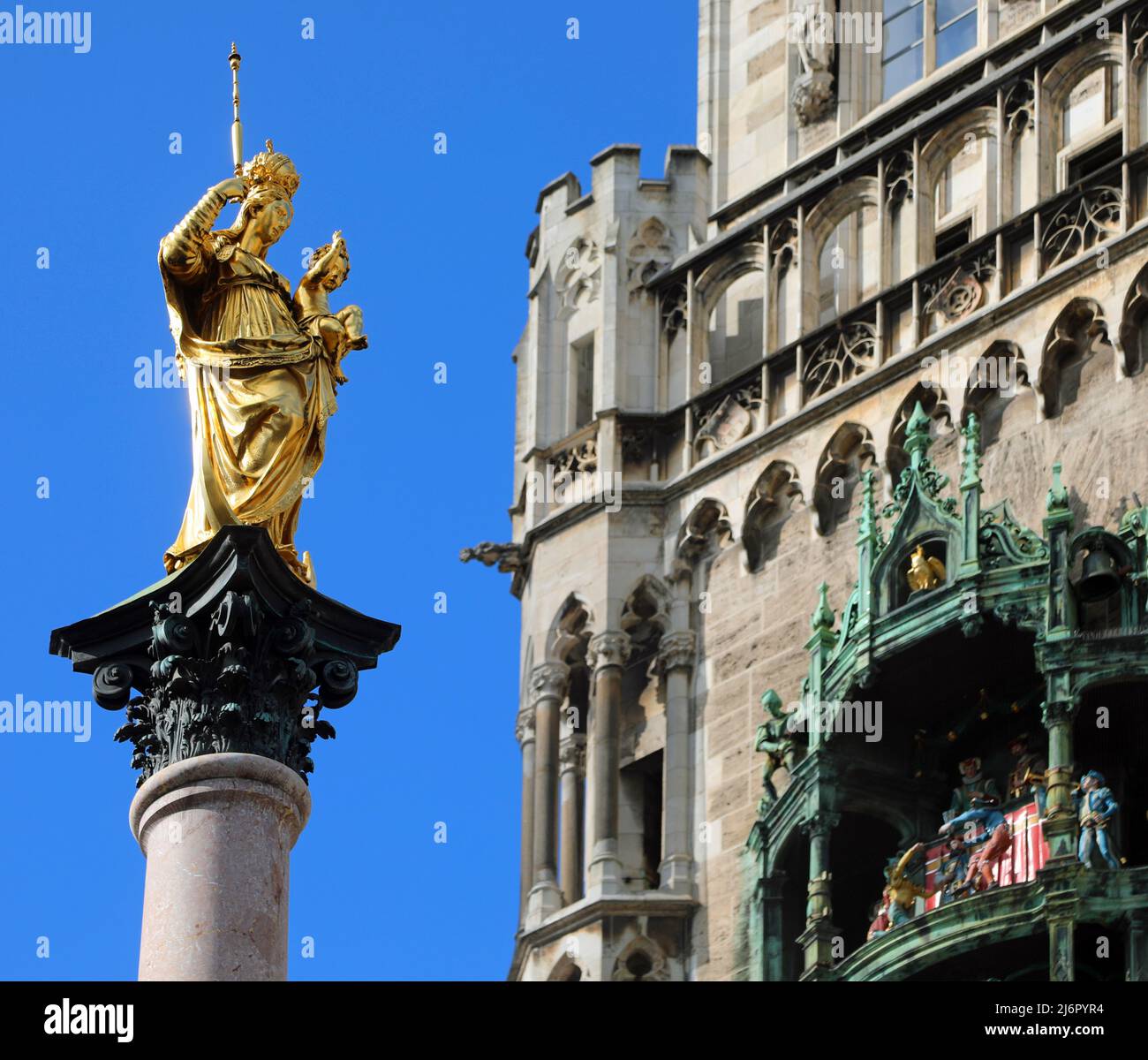 Golden Statue of Holy Mary in the Marienplatz in Munich city in Germany ...