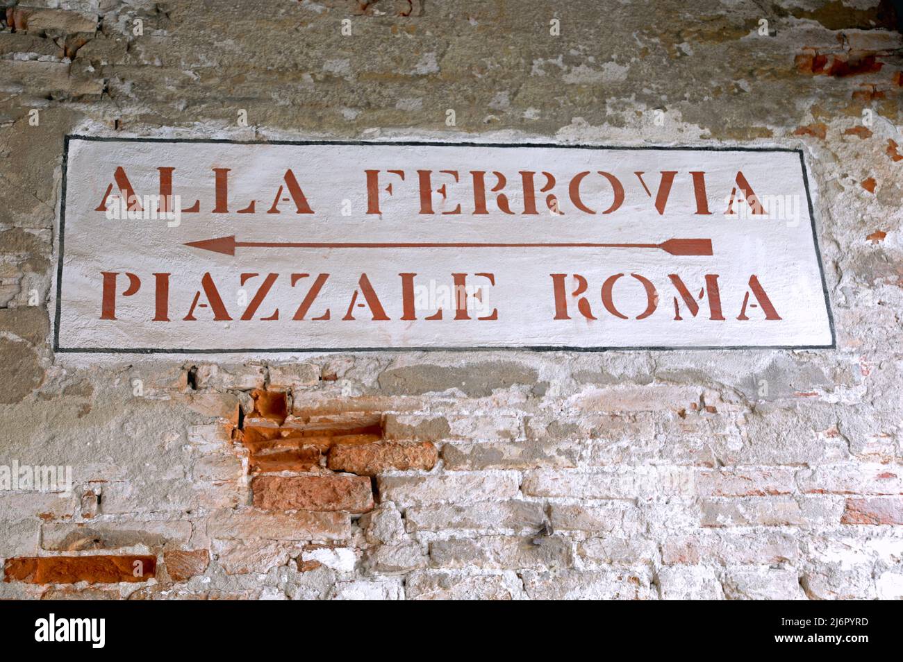 Road signs with arrows and the text TO ROME SQUARE or to RAILWAY ...