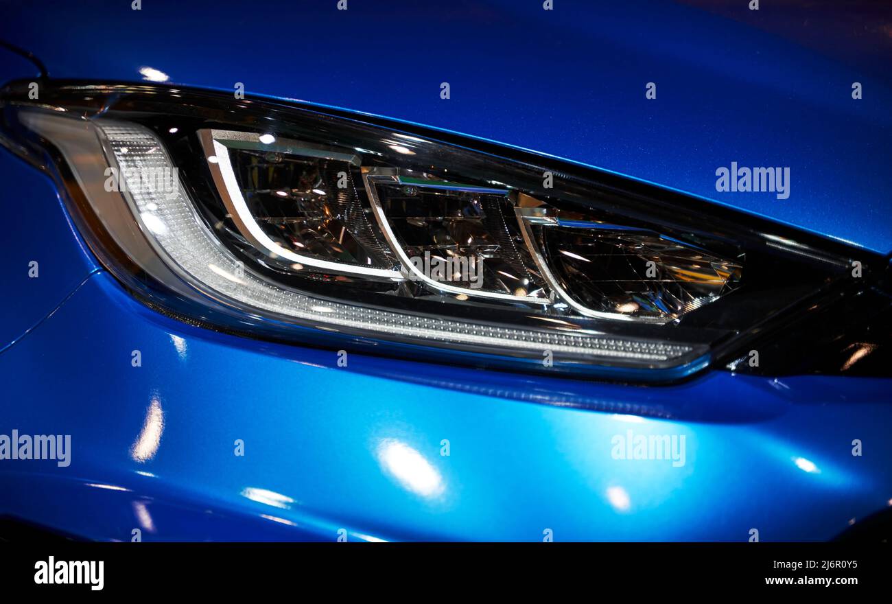 Close-up The Beautiful car headlights. Blue car close up shot Stock ...