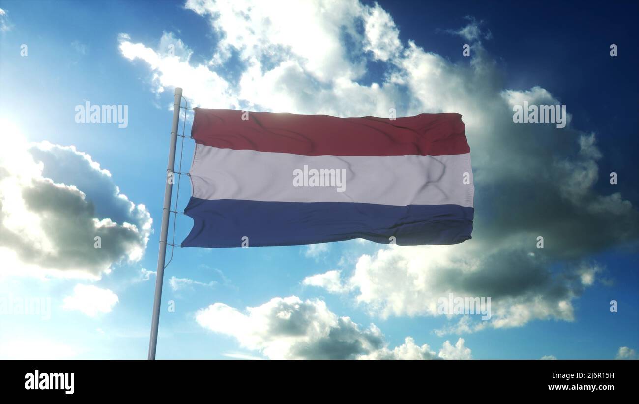 Flag of Netherlands waving at wind against beautiful blue sky. 3d ...