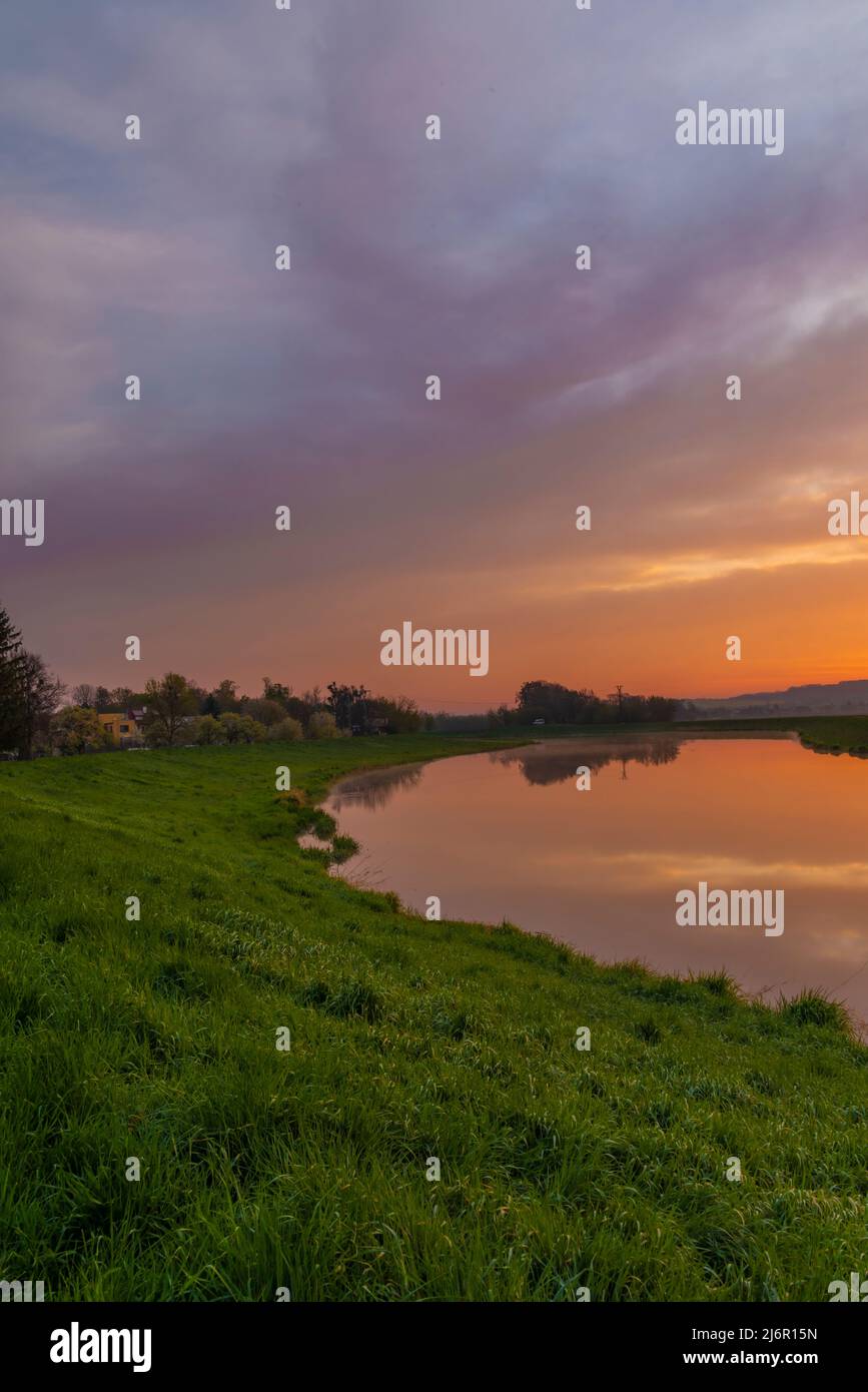 Morava river with color sunrise near Kvasice village in central Moravia ...