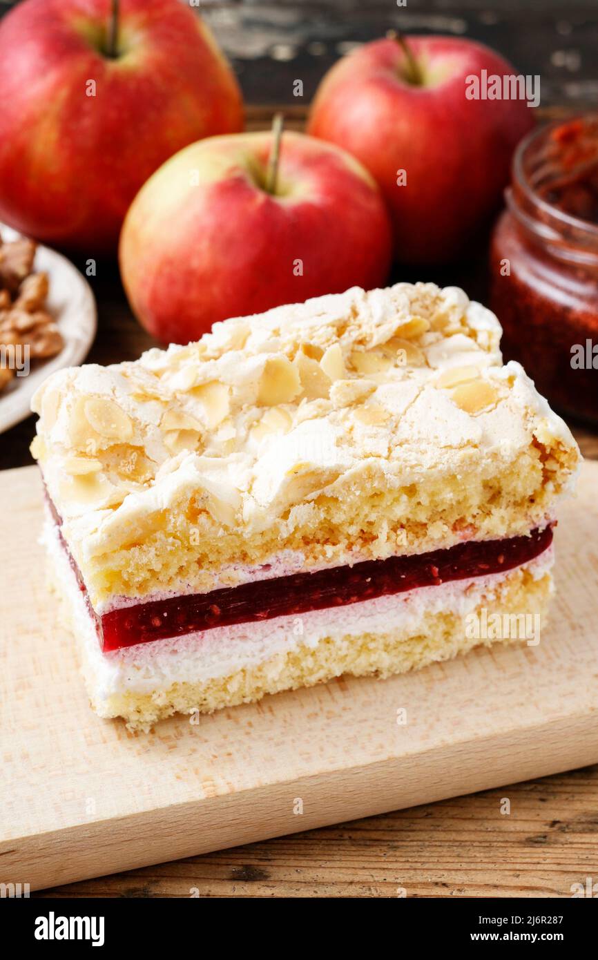 Layer fruit cake with meringue topping. Party dessert Stock Photo - Alamy