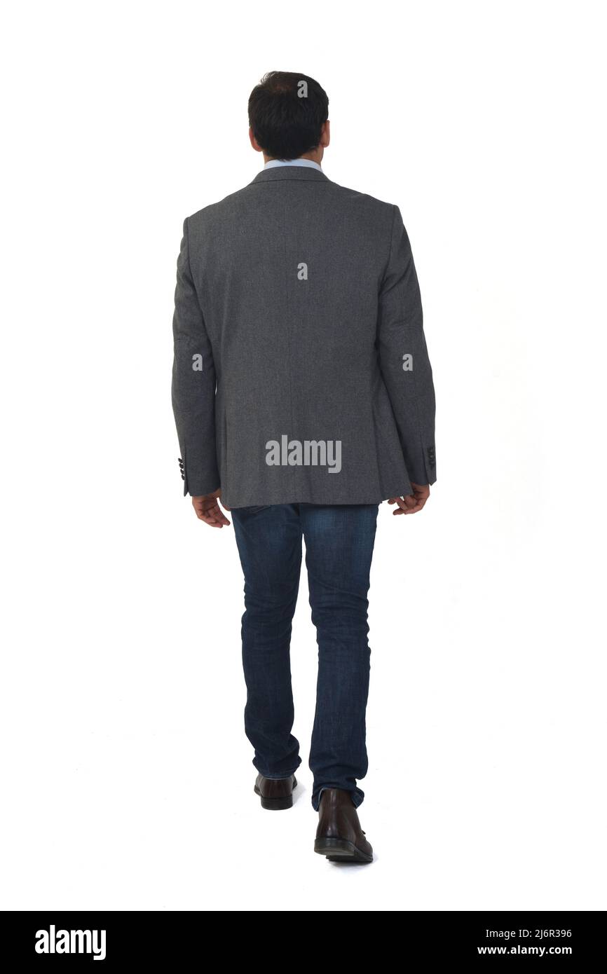 rear view of a man with blazer walking on white background Stock Photo ...