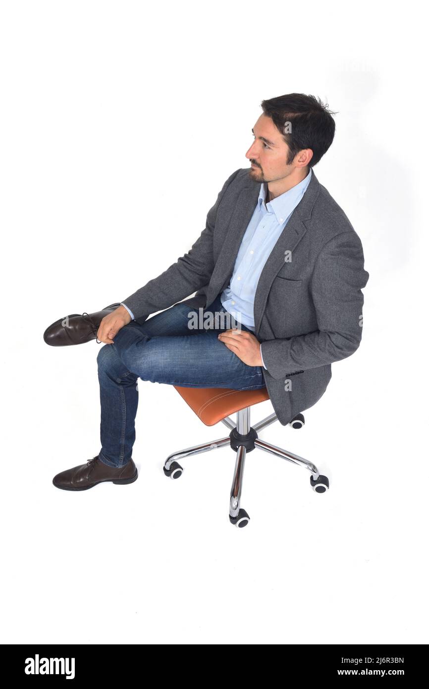 high angle view of a man sitting legs crossed on white background Stock ...