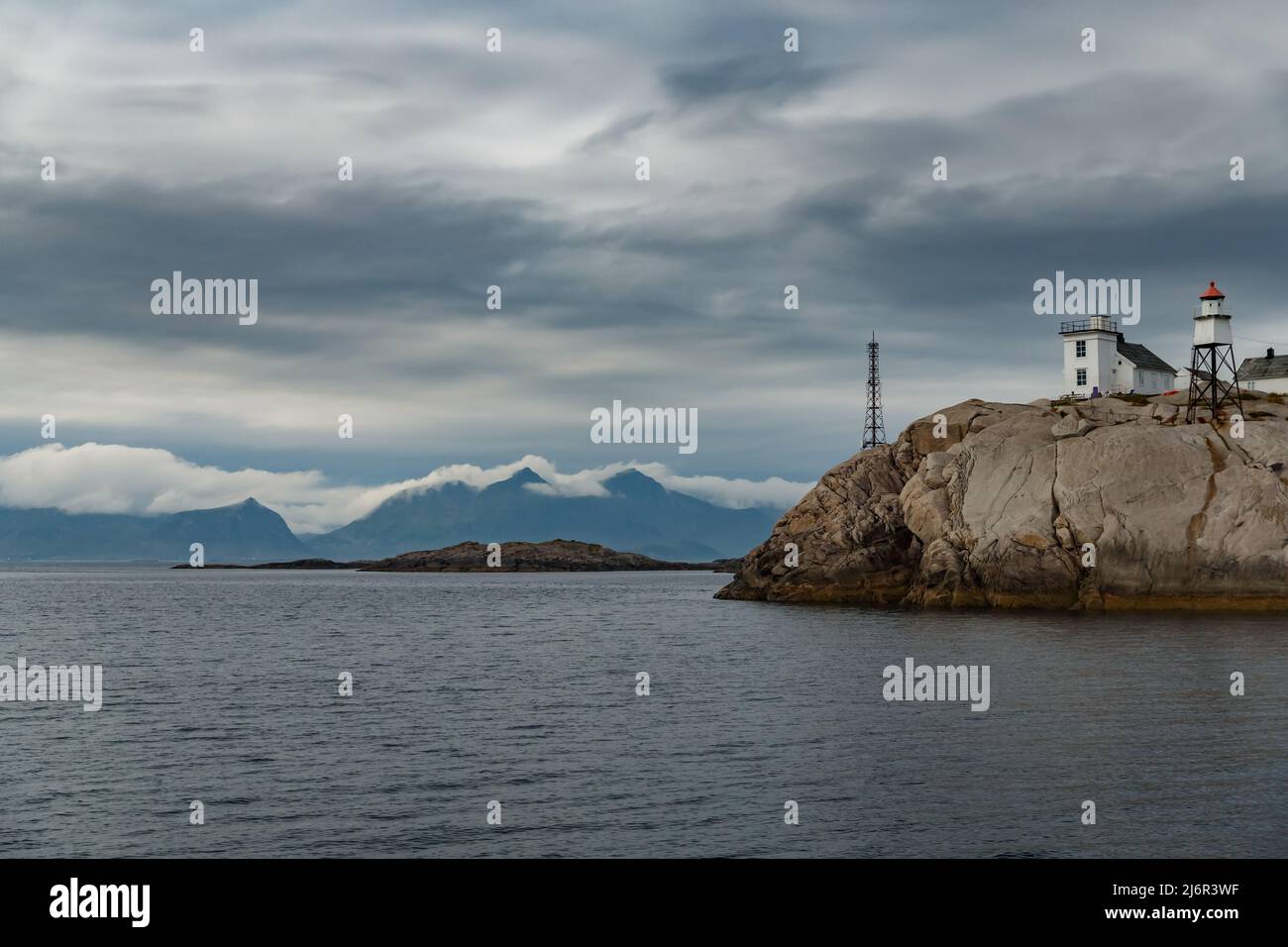 Norwegian seascape, rocky coast with dramatic skies, the sun breaks ...