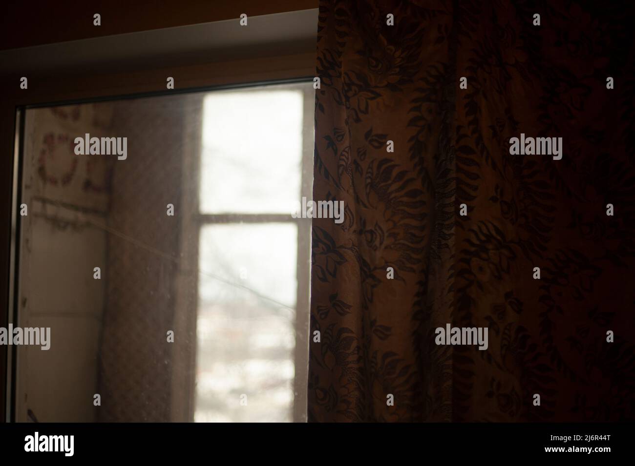 Window in room. Details of interior of apartment. Curtain on window ...