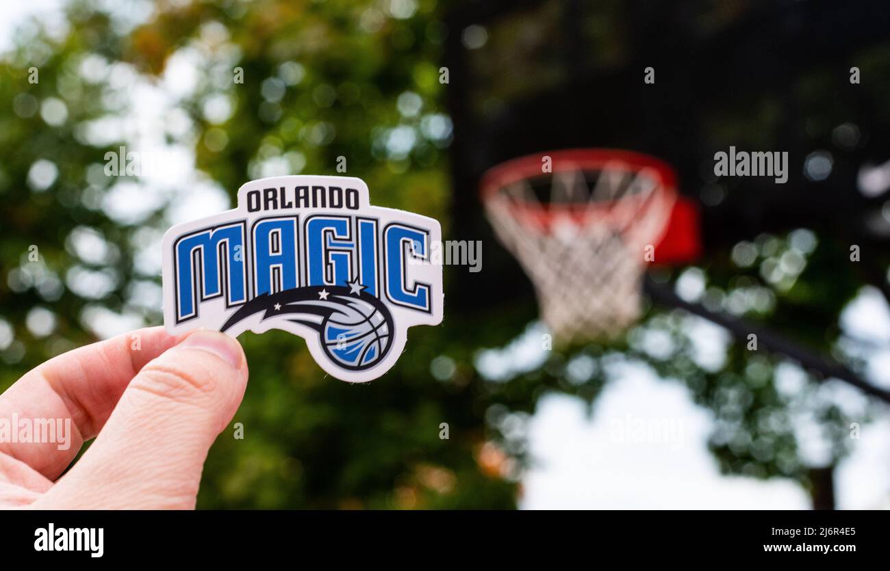 September 15, 2021, Orlando, USA, A man holds the emblem of the Orlando ...