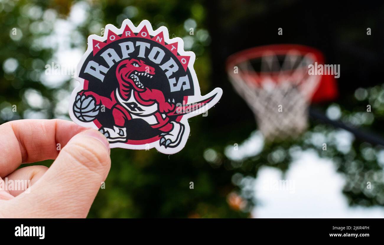 September 15, 2021, Toronto, Canada, A man holds the emblem of the ...
