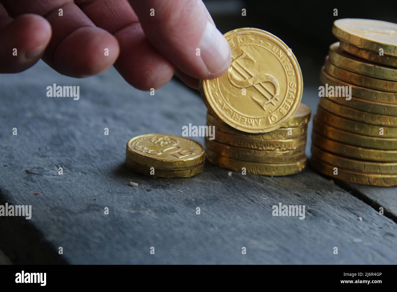 Profit growth, business concept. Chart profit from gold coins Stock ...