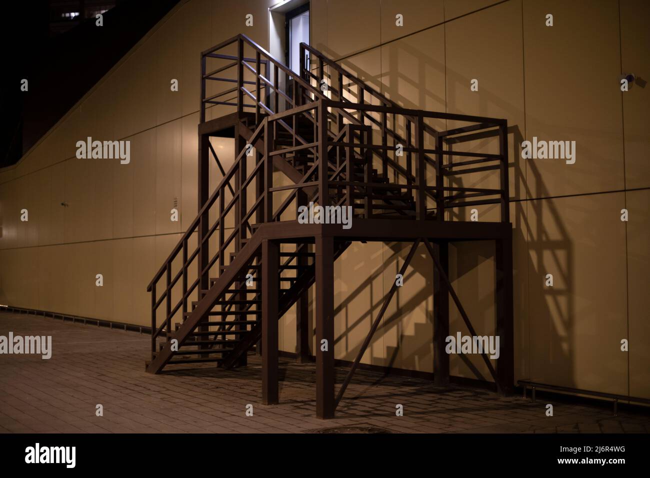 Fire escape in building. Emergency exit from house. Glass staircase ...