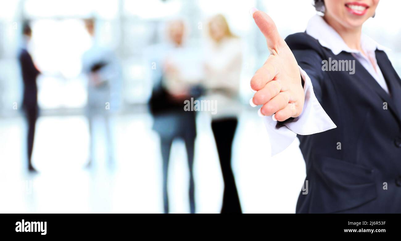 Business woman with hand extended to handshake Stock Photo - Alamy
