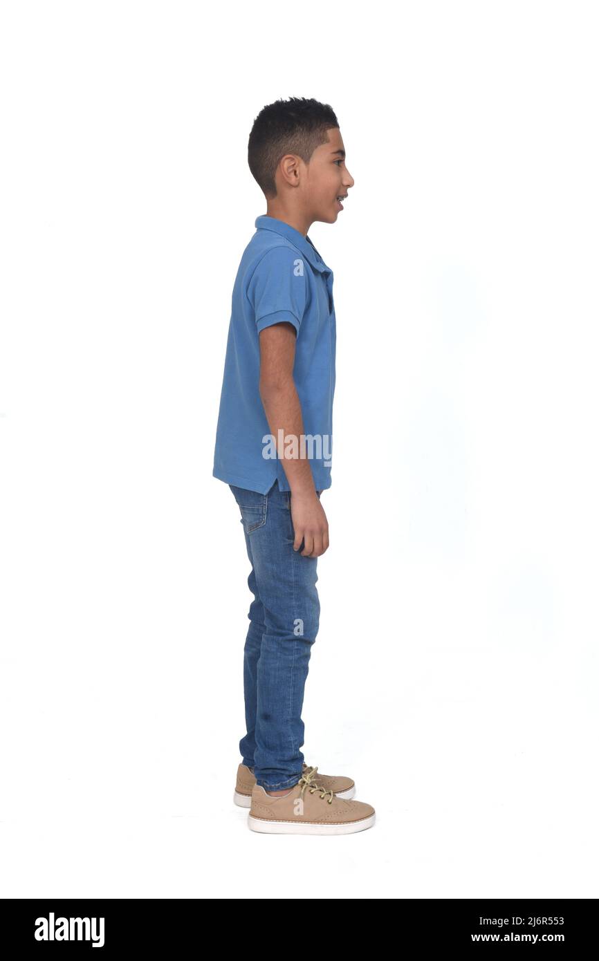 side view of boy looking on white background Stock Photo - Alamy