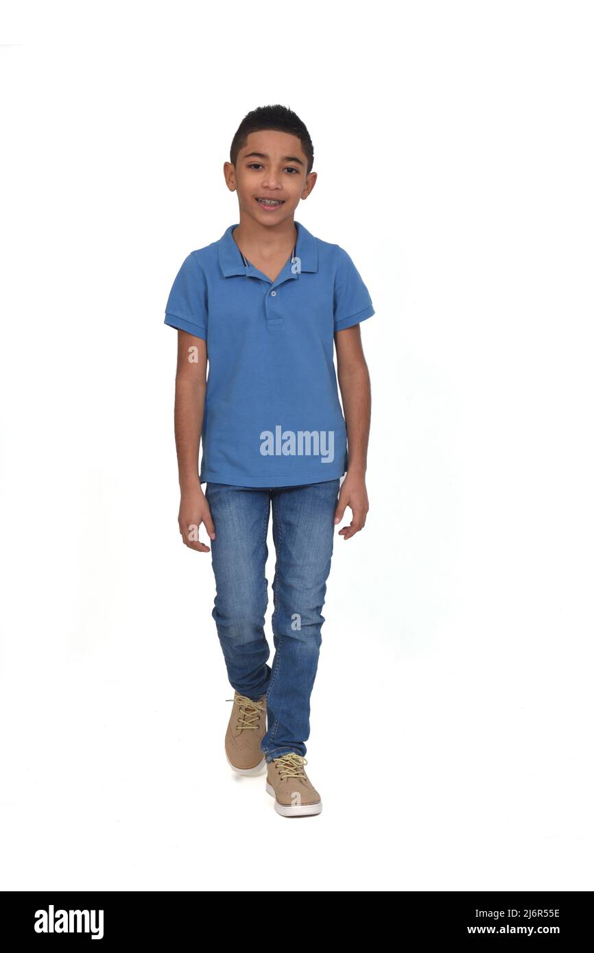 front view of boy walking on white background Stock Photo - Alamy