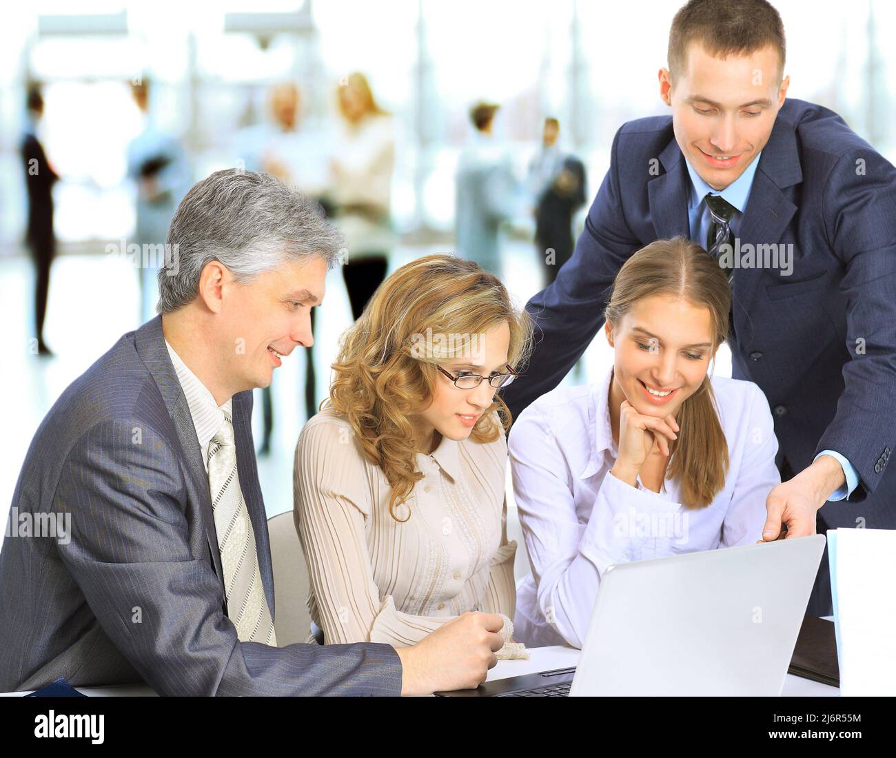 Business meeting - manager discussing work with his colleagues Stock ...