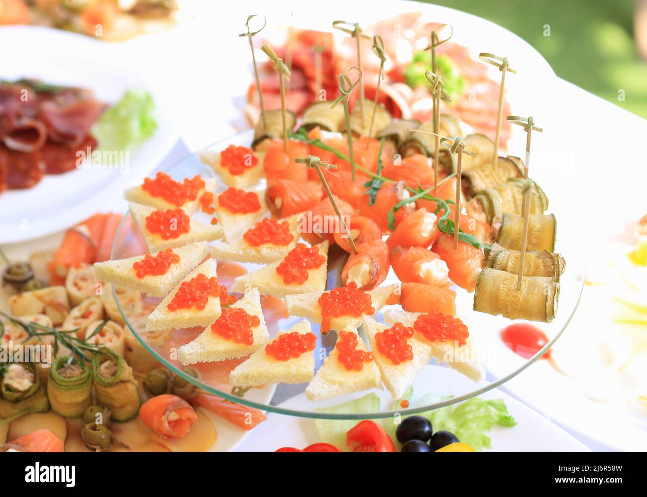 catering table set service with silverware and glass stemware at ...