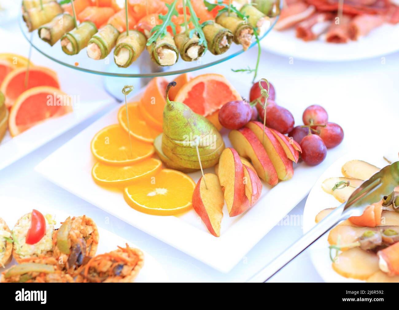 catering table set service with silverware and glass stemware at ...