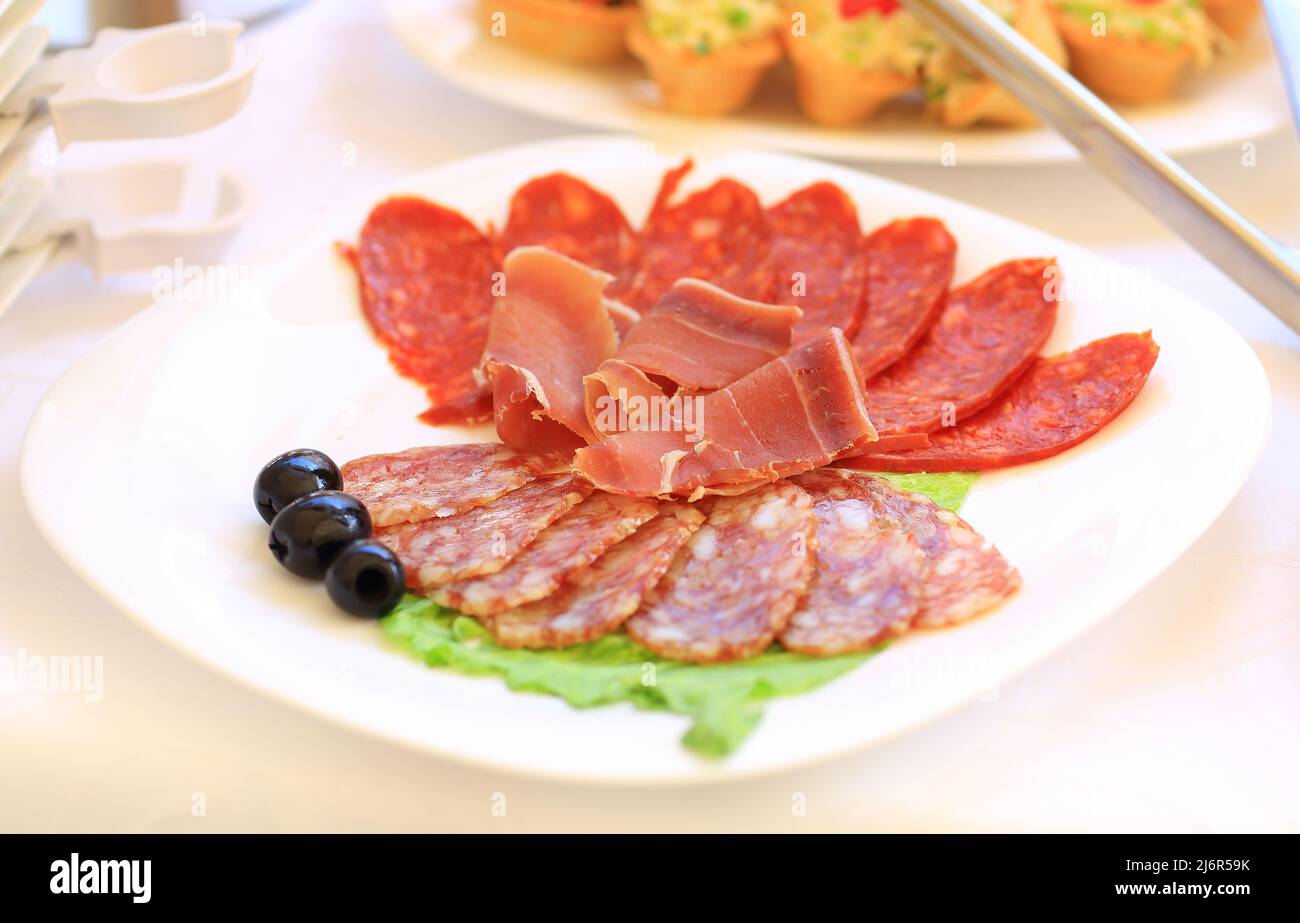 catering table set service with silverware and glass stemware at ...