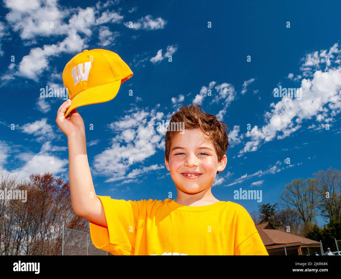 Little League c.2009 Happy kid Stock Photo - Alamy