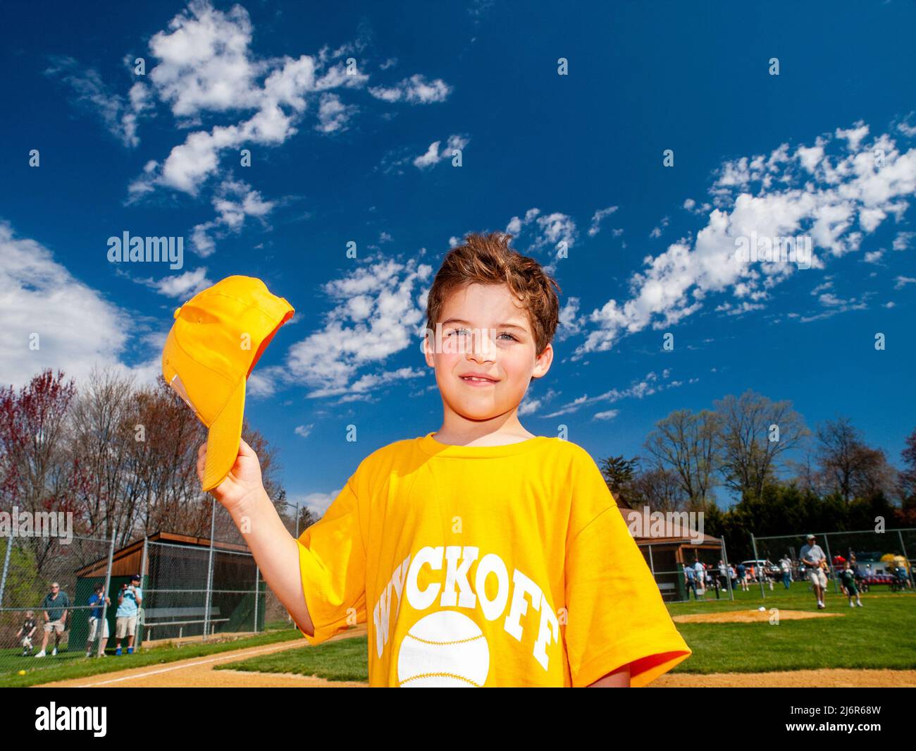 Little League c.2009 Happy kid Stock Photo - Alamy