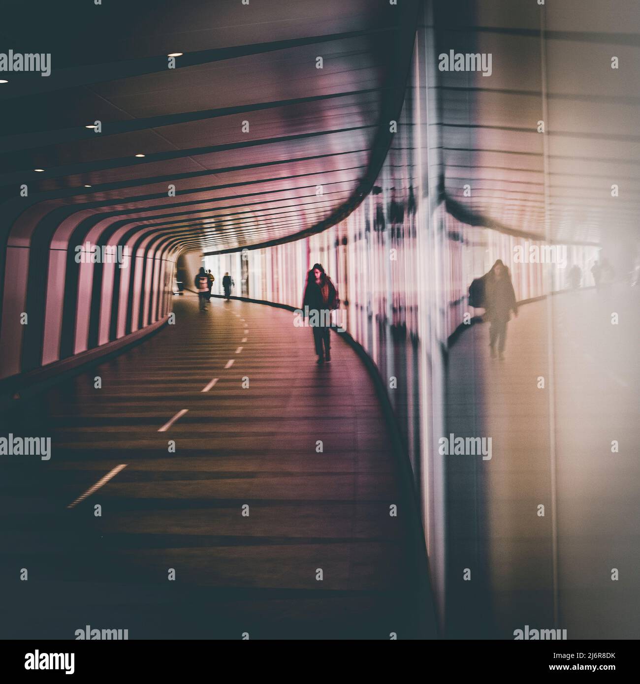 Futuristic looking pedestrian tunnel featuring an LED integrated light ...