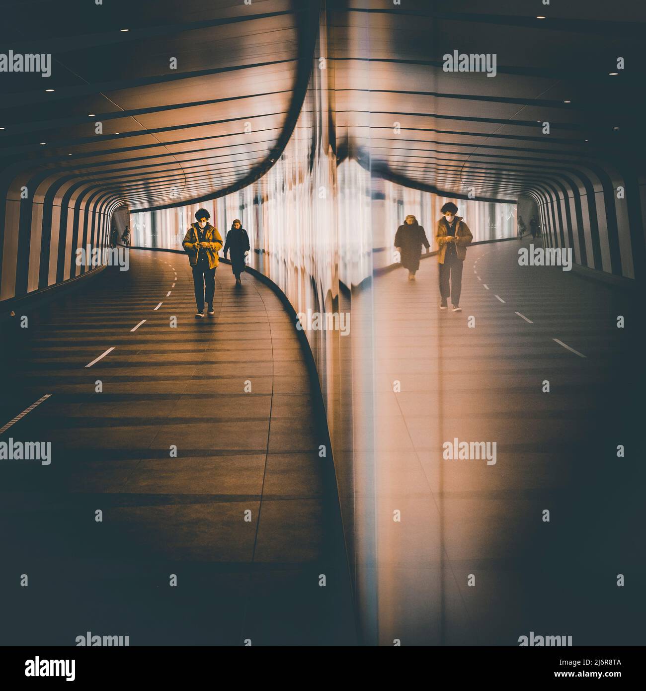 Futuristic looking pedestrian tunnel featuring an LED integrated light ...