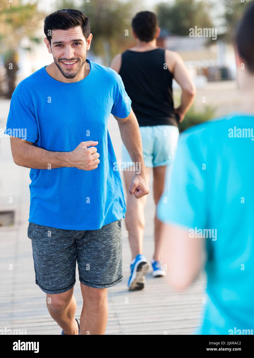Two friends are doing race in time training Stock Photo - Alamy