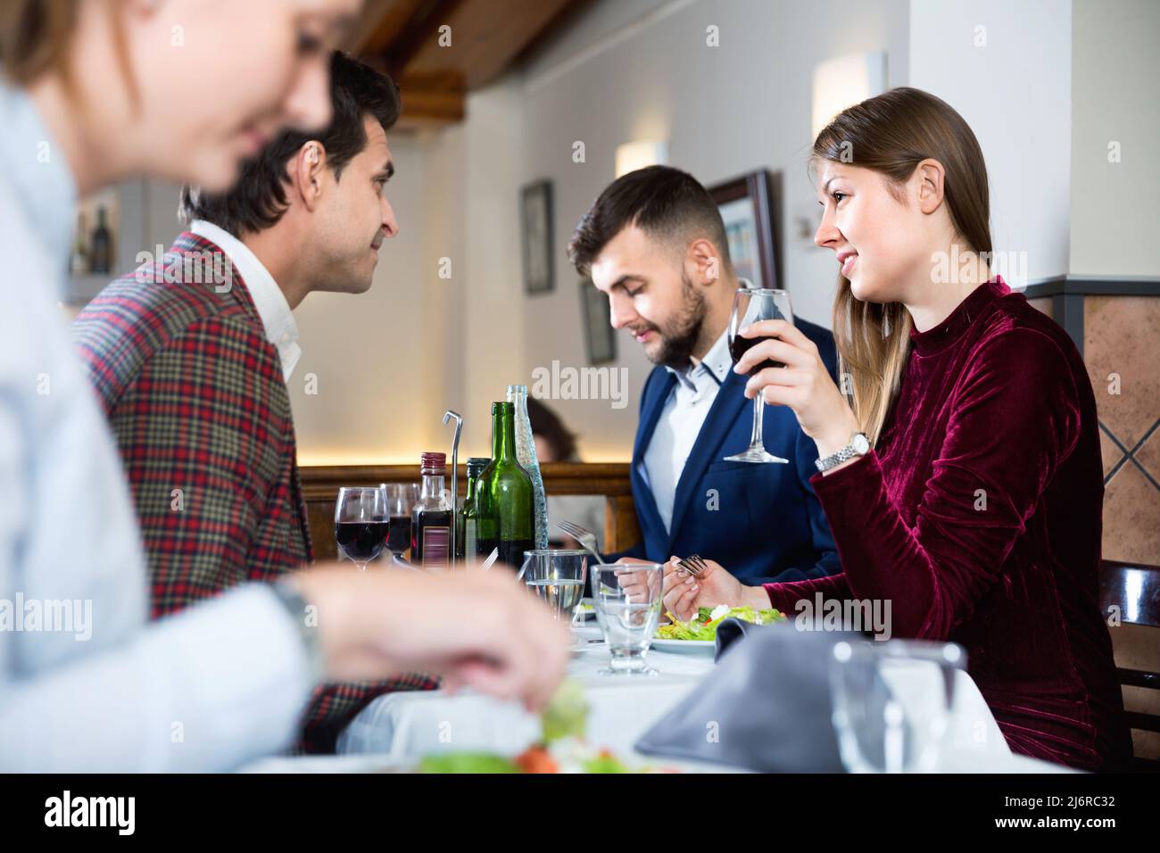 Family celebrating holiday in restaurant hi-res stock photography and ...