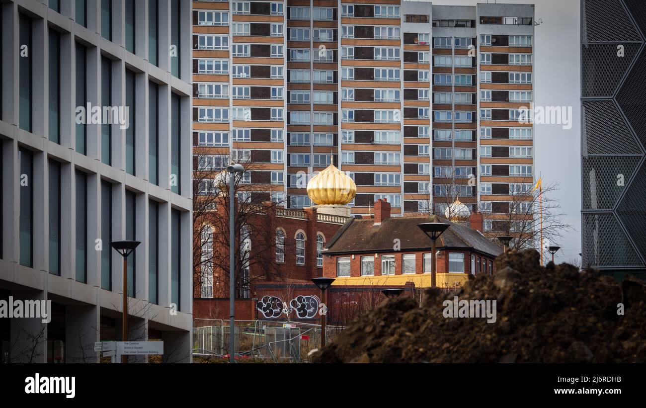 Golden dome of a Sikh temple in an urban British landscape, surrounded ...