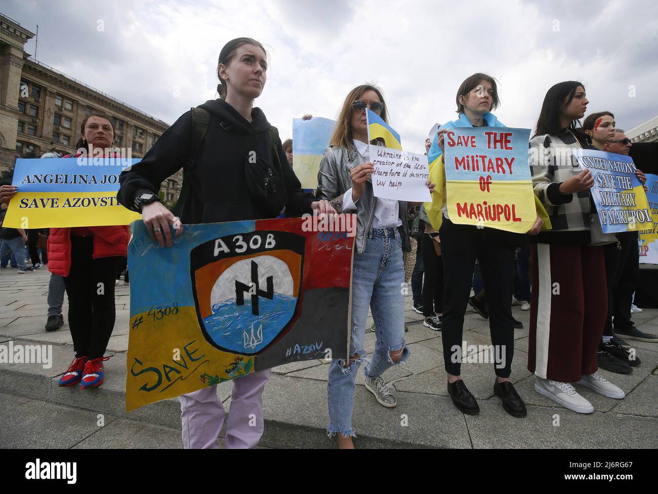 Kyiv, Ukraine - 03 May 2022, Protesters hold placards expressing their ...