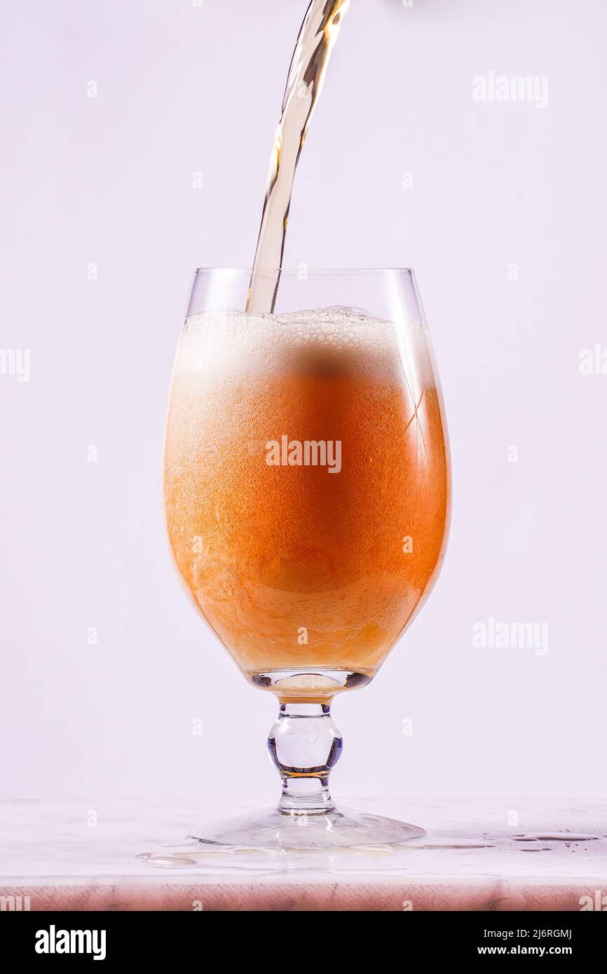 Glass of cold and light beer isolated on white background Stock Photo ...