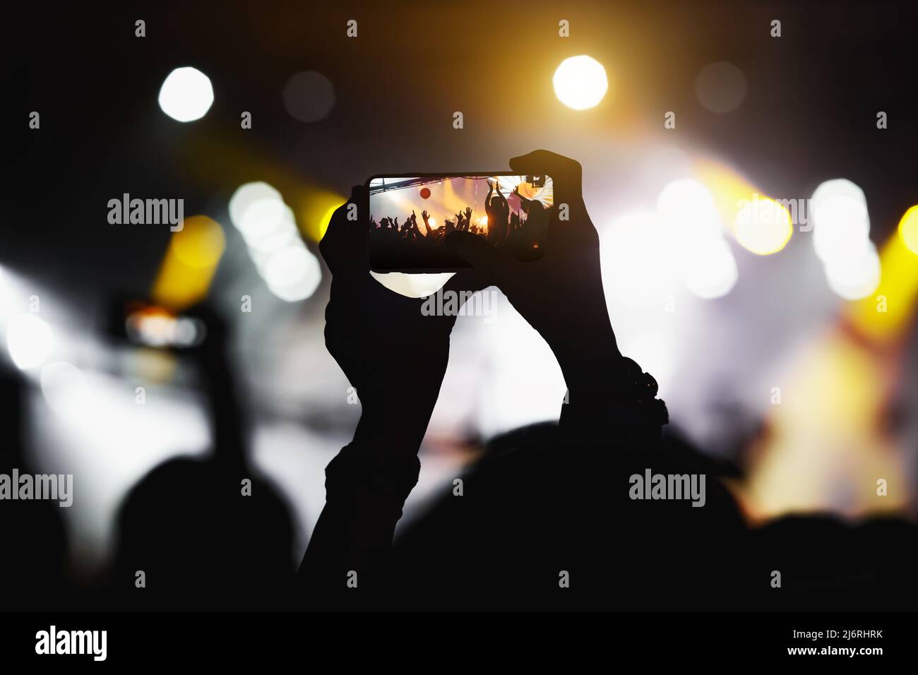 The fan taking a photo of a concert at a festival Stock Photo - Alamy
