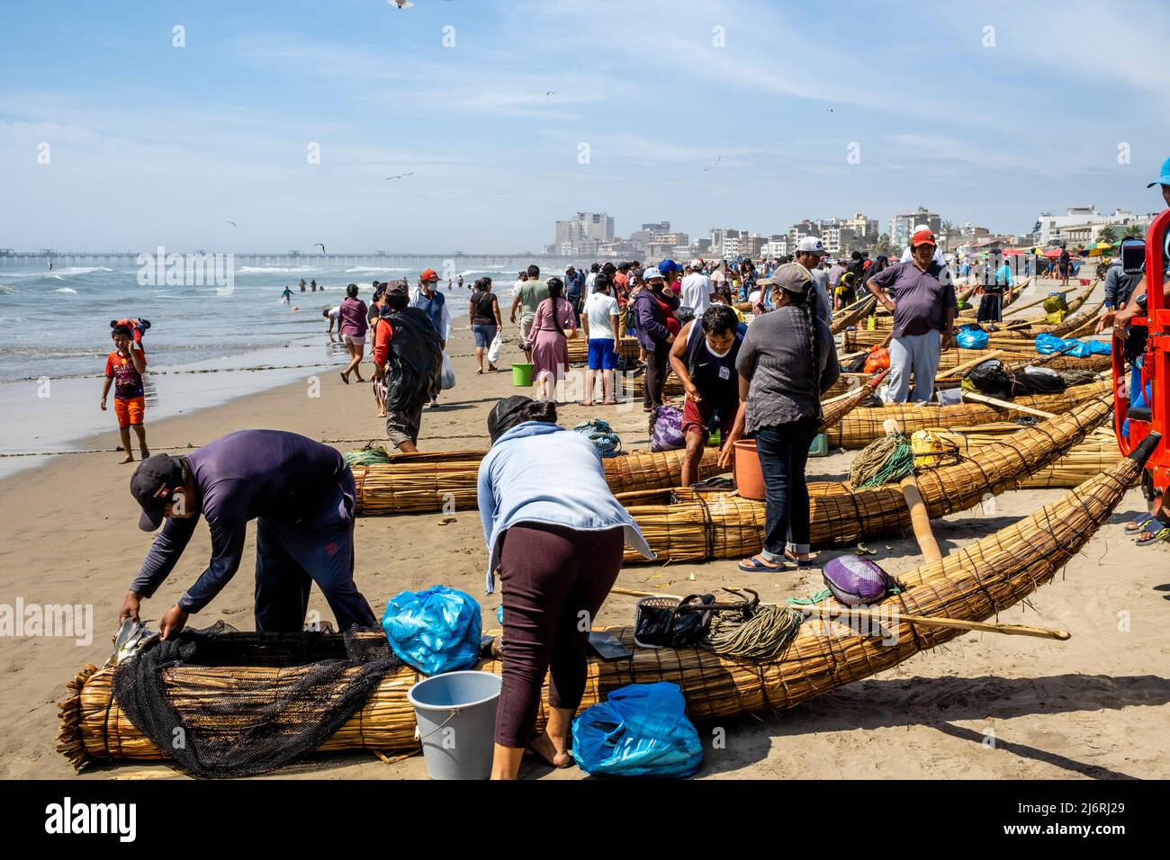 Local People Selling Fresh Fish From Their Caballitos De Totora ...