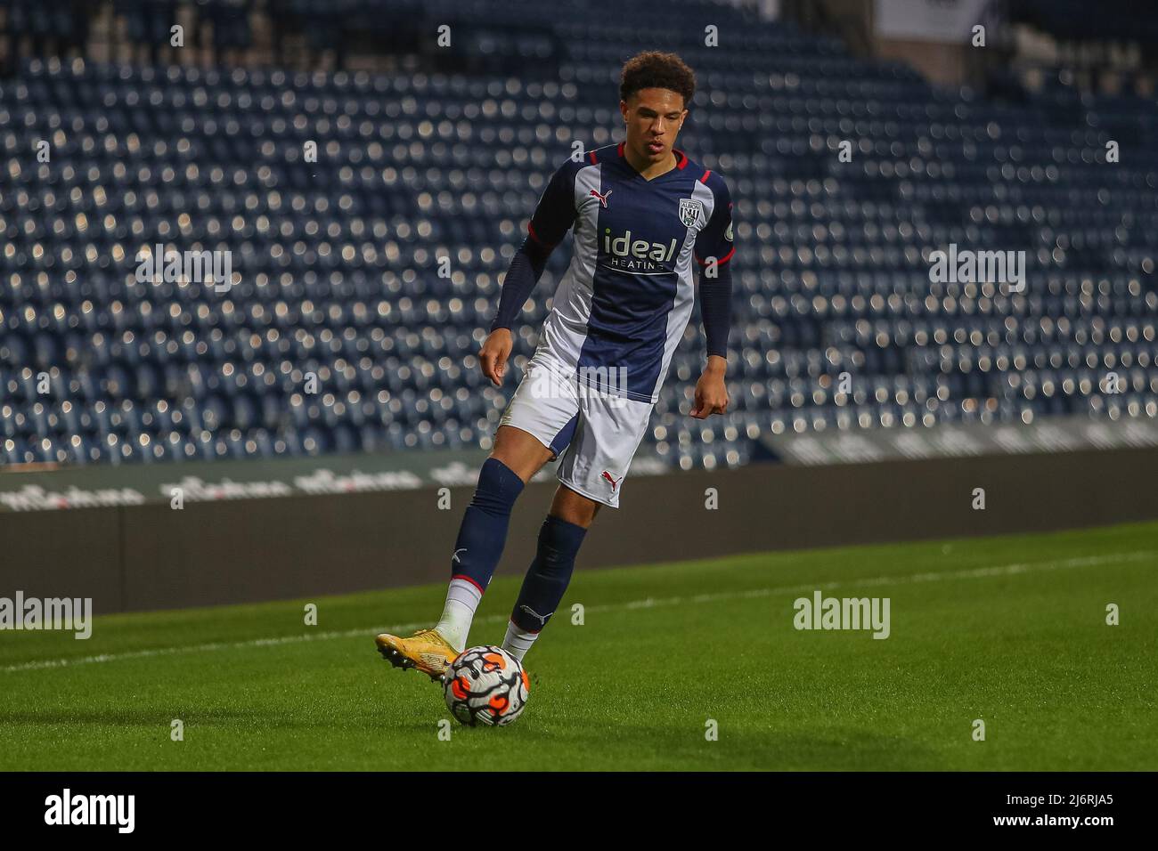 Ethan Ingram #34 of West Bromwich Albion controls the ball in West ...
