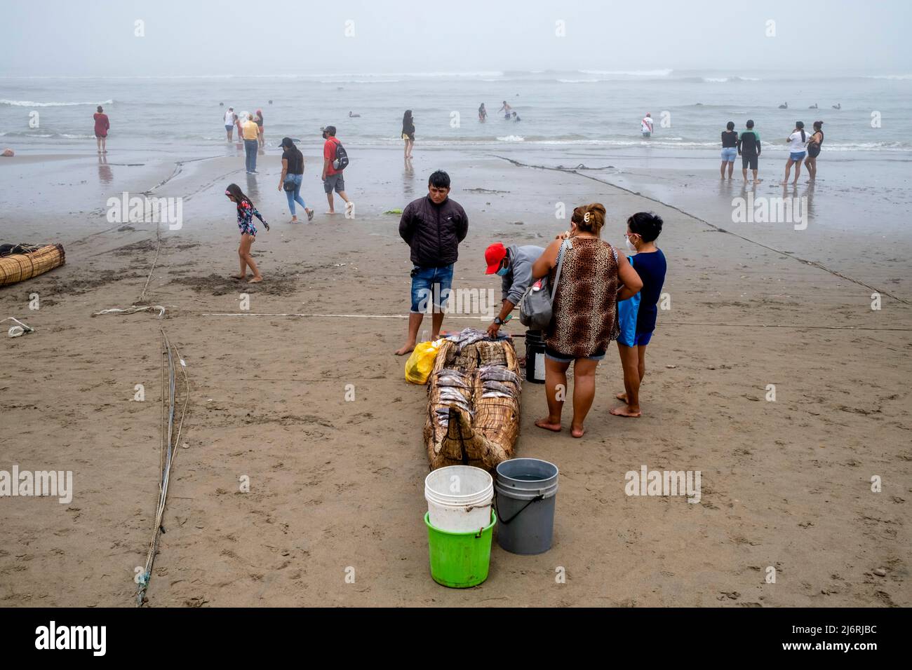 Local People Selling Fresh Fish From Their Caballitos De Totora ...