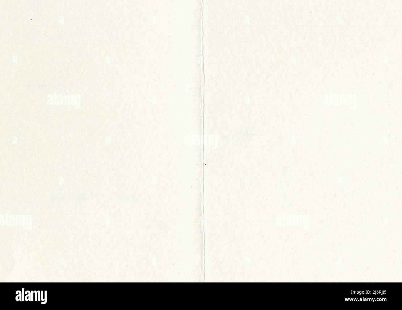 Large image of close up paper texture background folded in half with ...