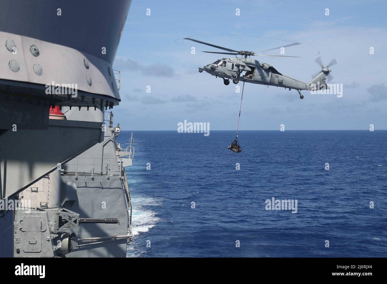 PHILIPPINE SEA (April 30, 2022) An MH60-R Sea hawk helicopter, assigned ...