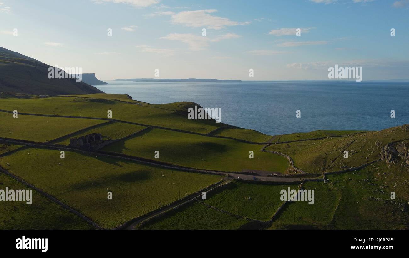 The beautiful Causeway Coast at Torre Head in Northern Ireland - aerial ...