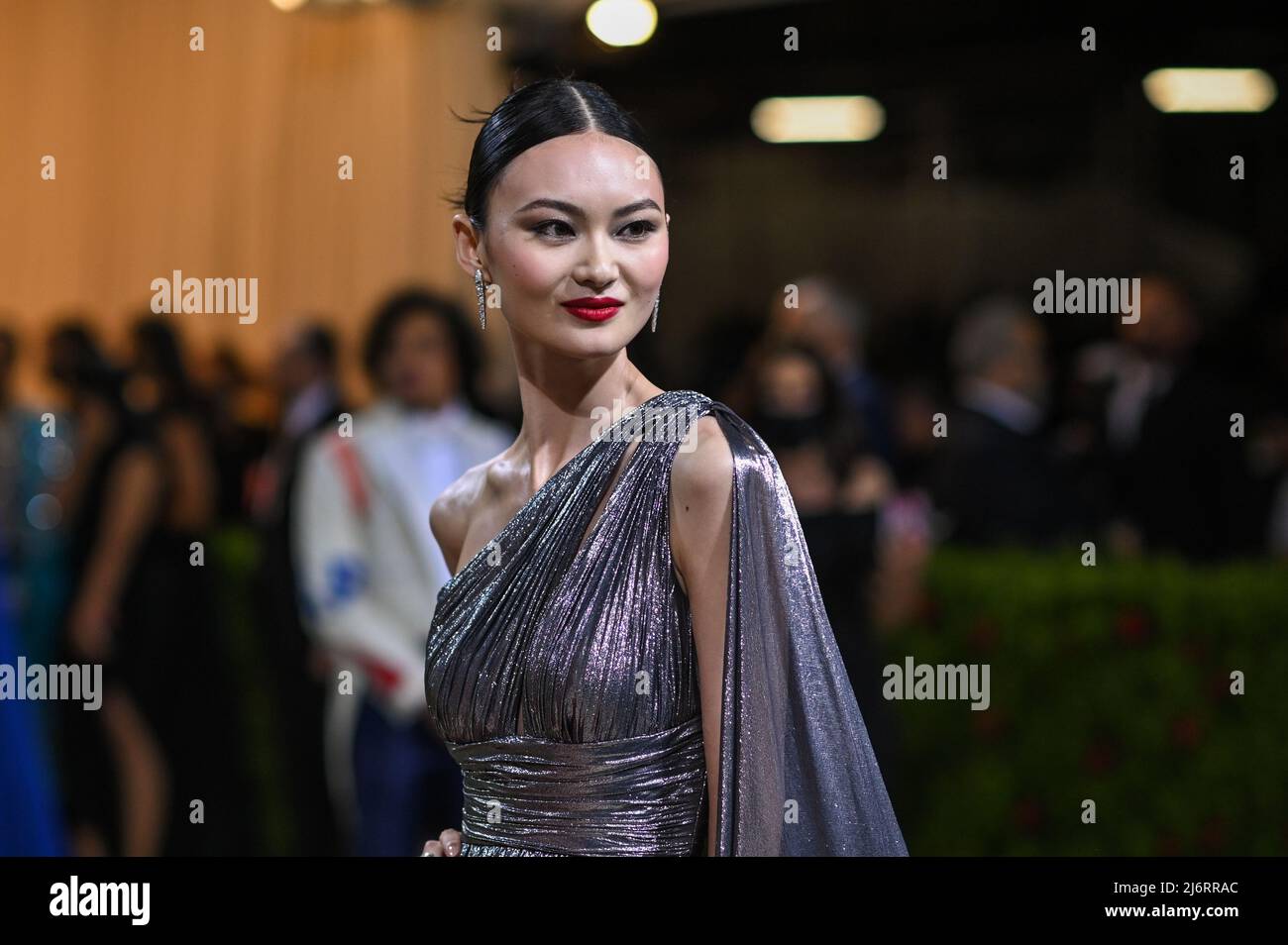 He Cong walking on the red carpet at the 2022 Metropolitan Museum of ...