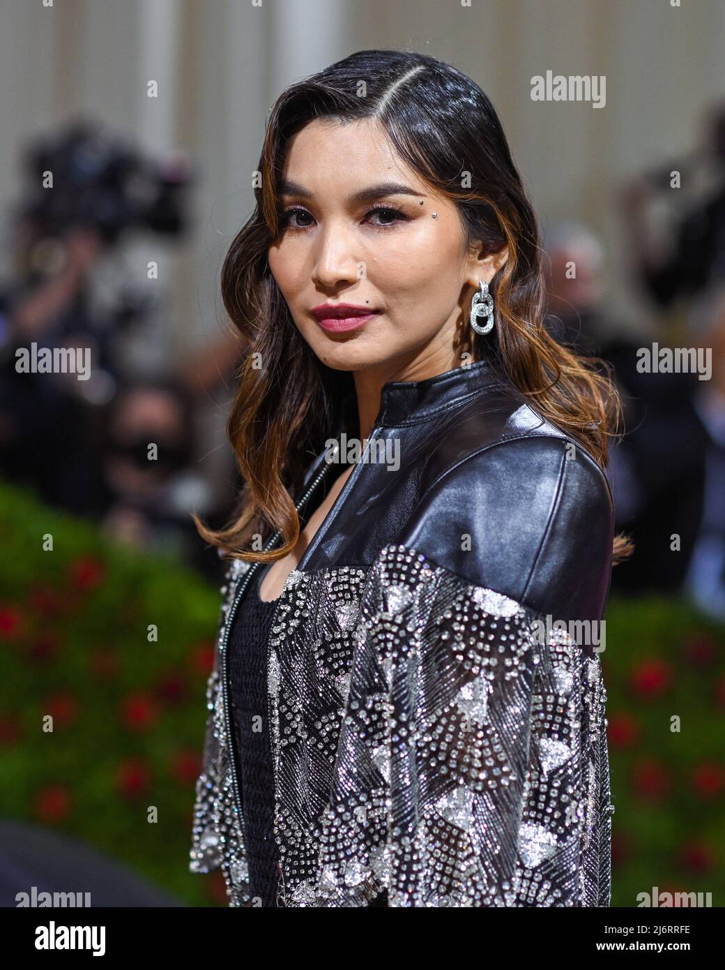 Gemma Chan walking on the red carpet at the 2022 Metropolitan Museum of ...