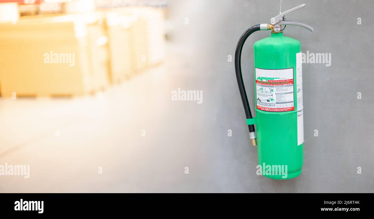 Fire extinguishers hanging on the wall are available in fire ...
