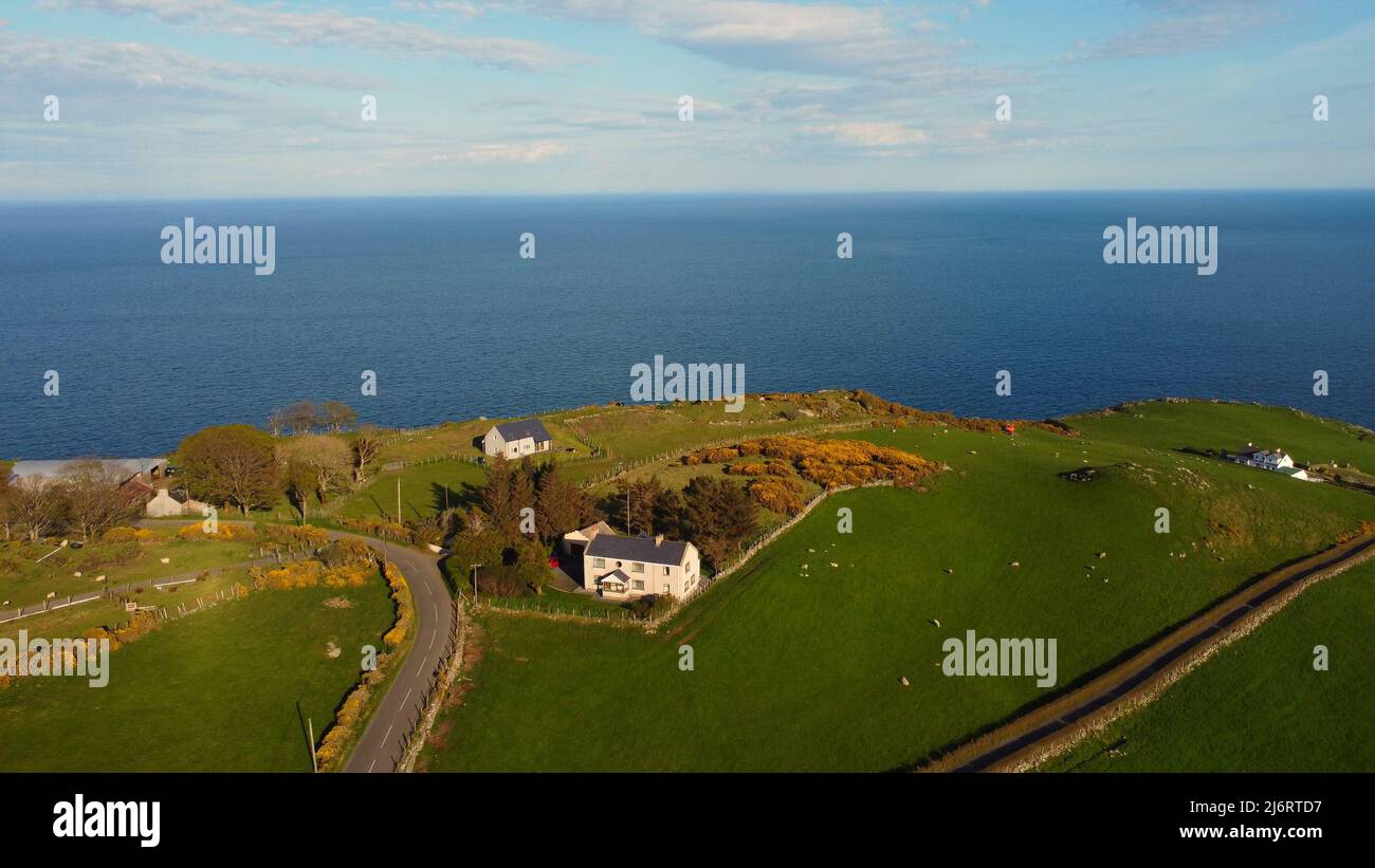 The beautiful Causeway Coast at Torre Head in Northern Ireland - aerial ...
