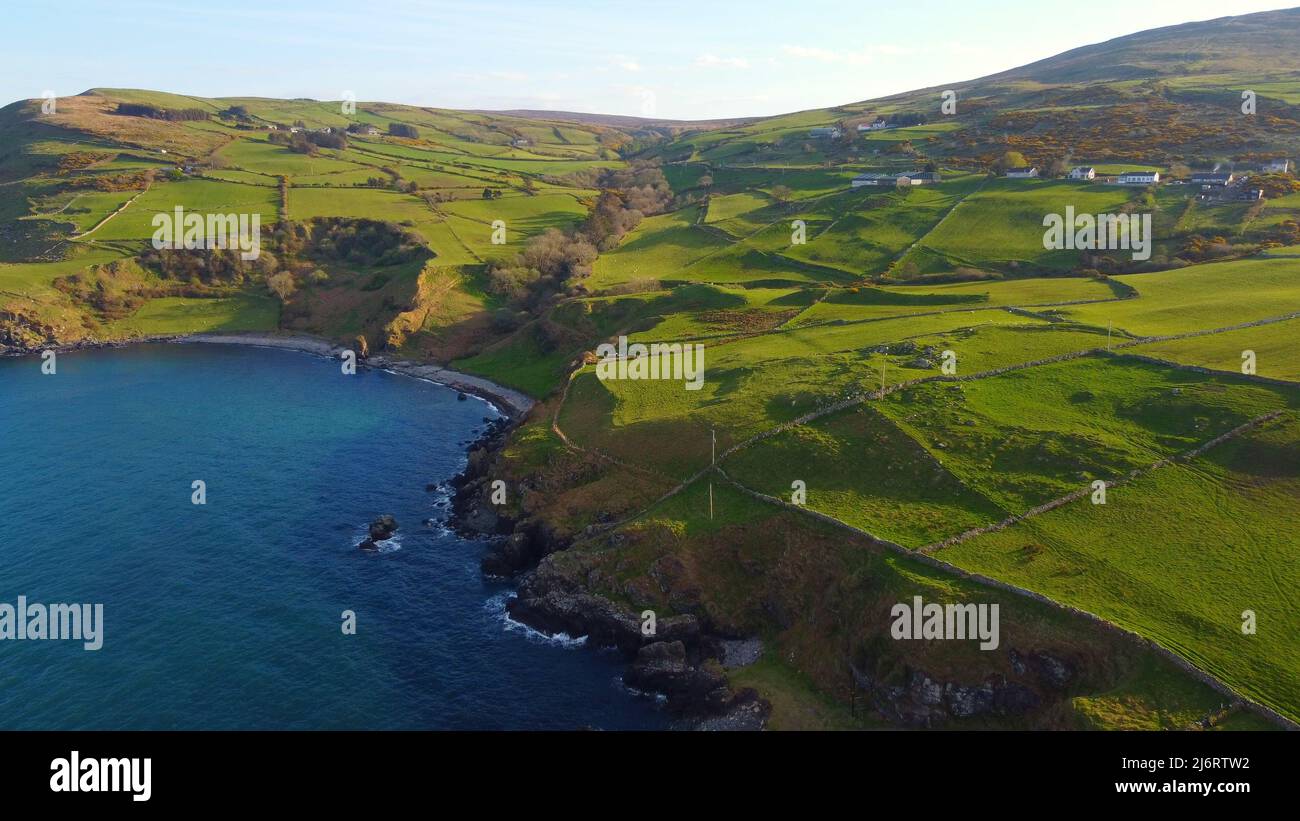The beautiful Causeway Coast at Torre Head in Northern Ireland - aerial ...