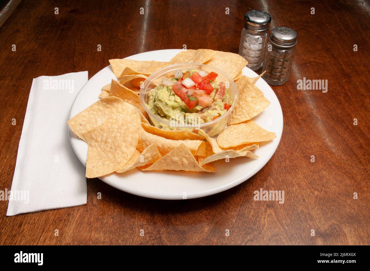 Authentic tex mex mexican cuisine known as guacamole and chips Stock ...